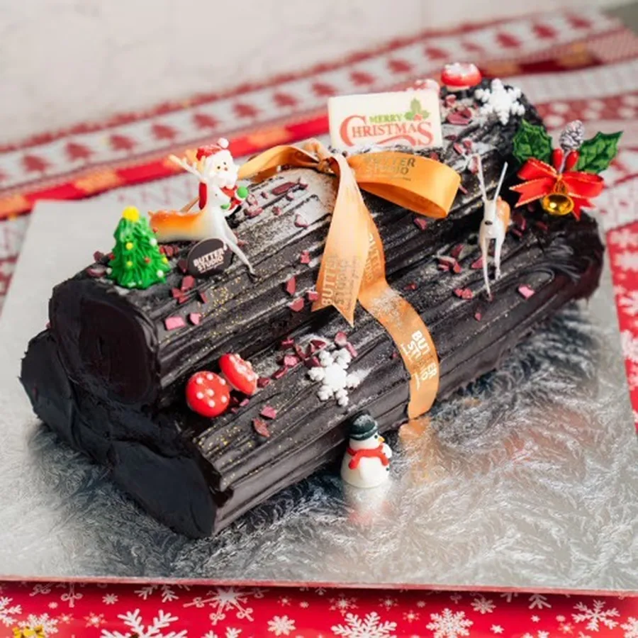 [BESTSELLER] Triple Chocolate Yule Log Cake at $82.90 per Cake | Butter ...